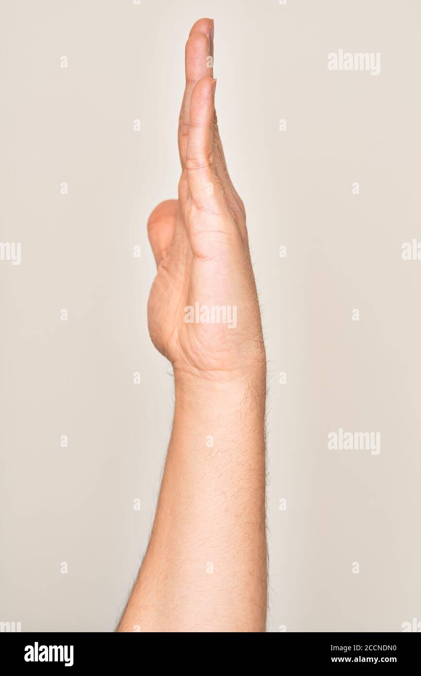 Hand of caucasian young man showing fingers over isolated white ...