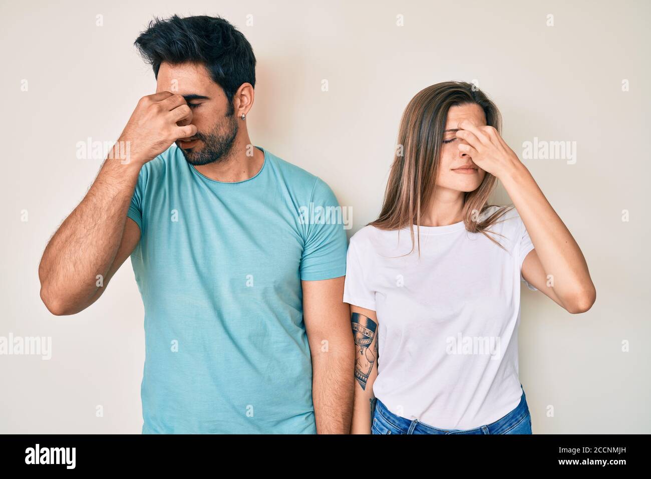 Beautiful young couple of boyfriend and girlfriend together tired ...