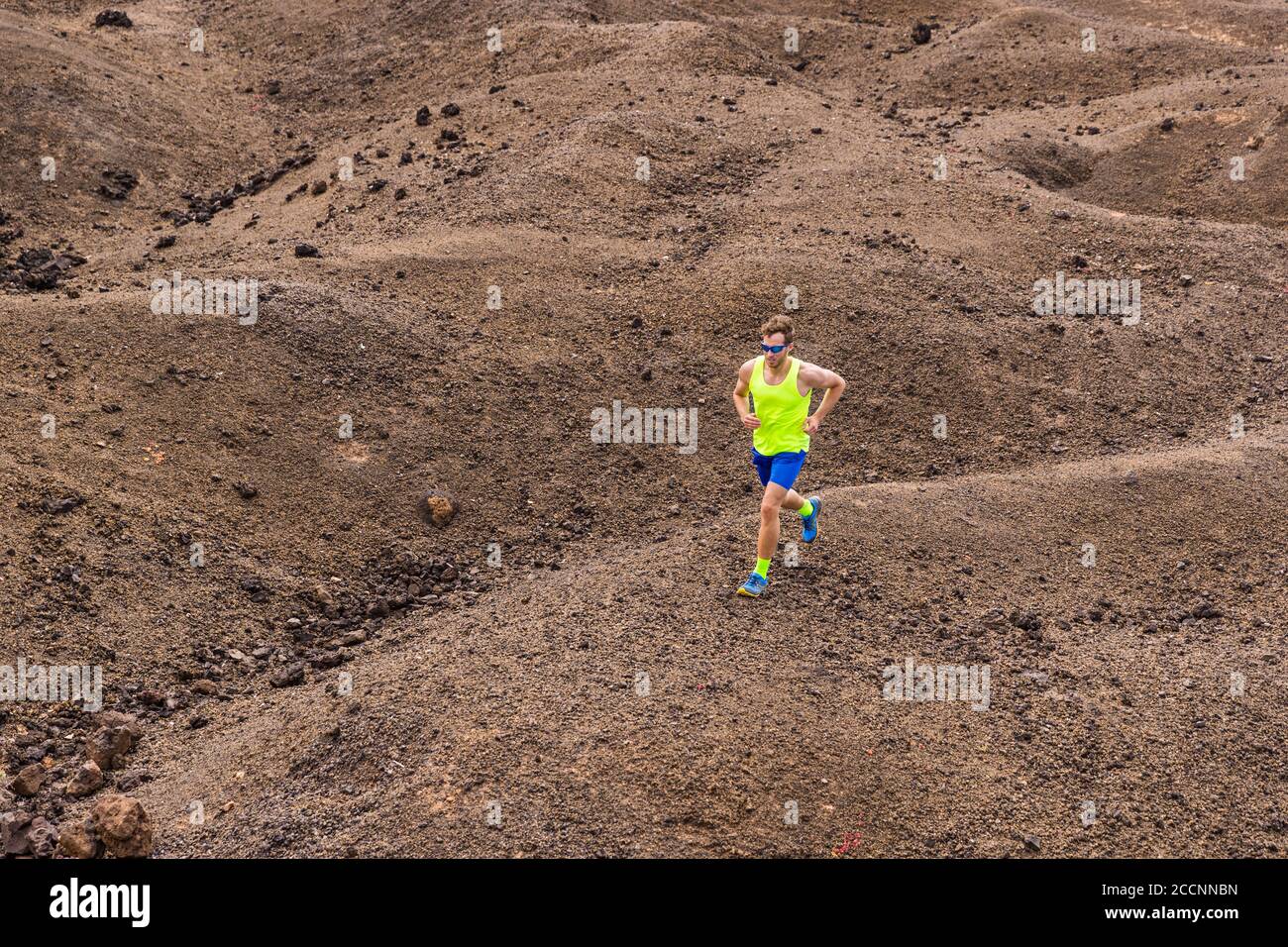 Man trail running in the mountain hills nature landscape. Ultra runner ...