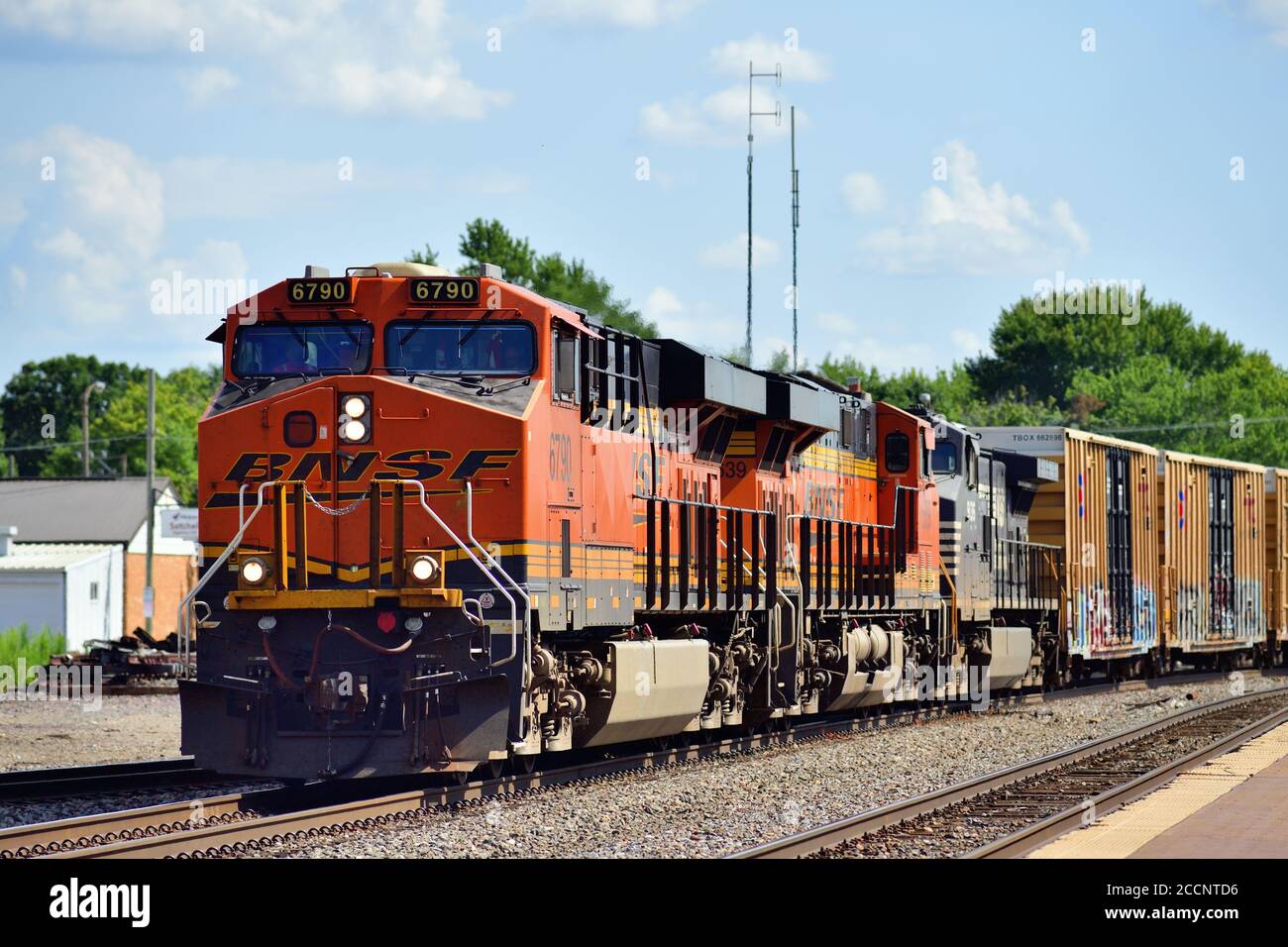 Mendota, Illinois, USA. Three locomotives, including and off-road power Norfolk Southern unit ...