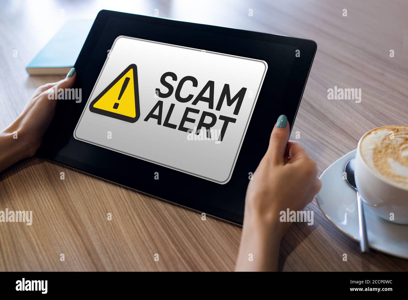 Scam alert detecting warning. Notification on device screen Stock Photo ...