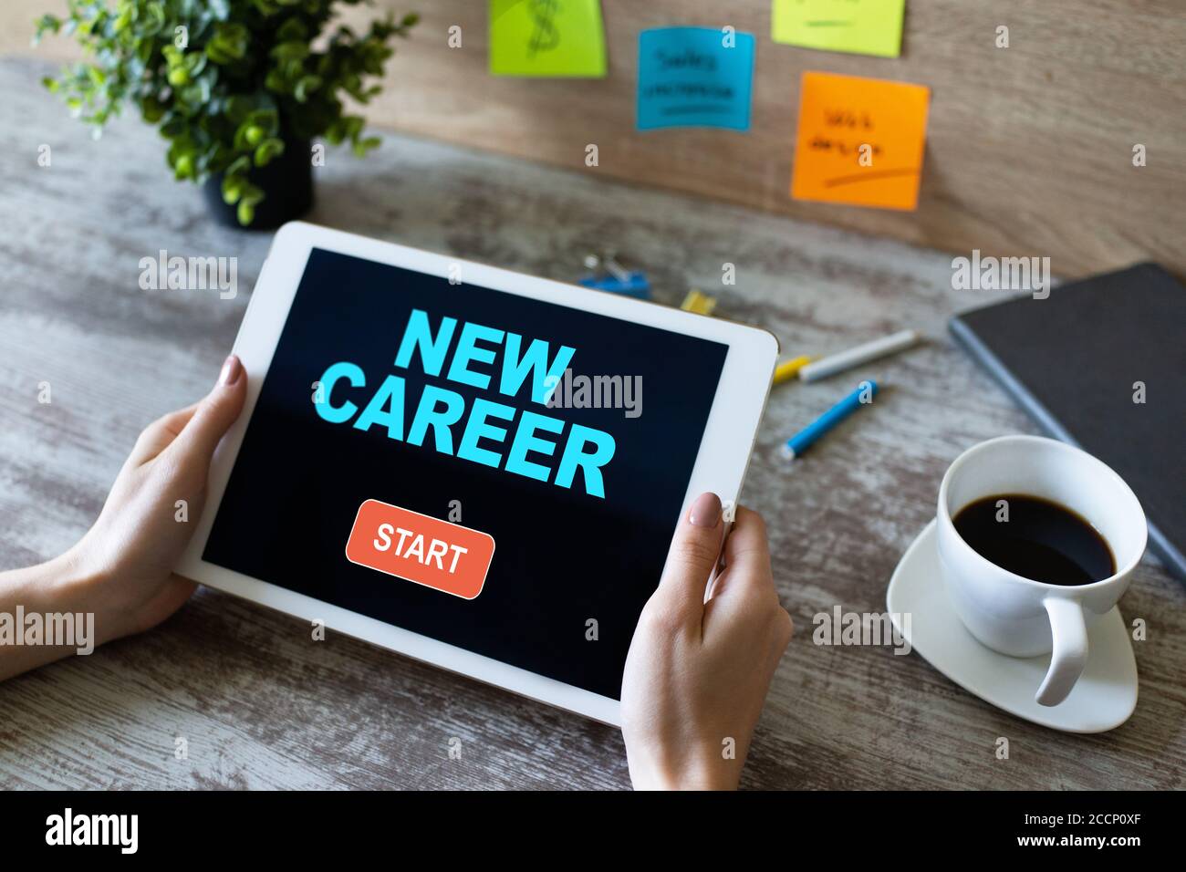 Start new career button on device screen. Recruitment and personal ...
