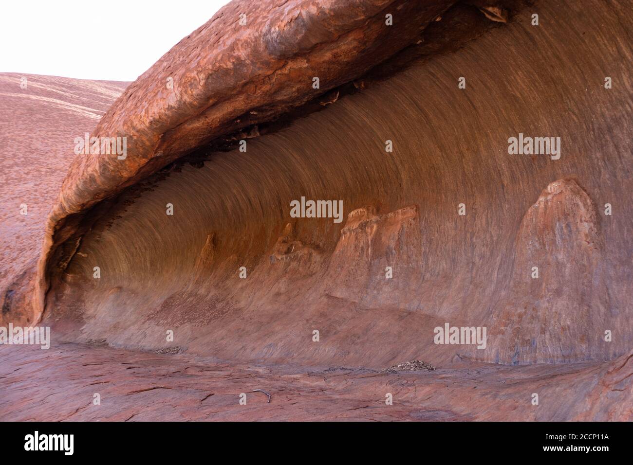 Wave wall at sacred Mount Uluru. No people. Rock with wave shape inside ... Wave wall at sacred Mount Uluru. No people. Rock with wave shape inside ...