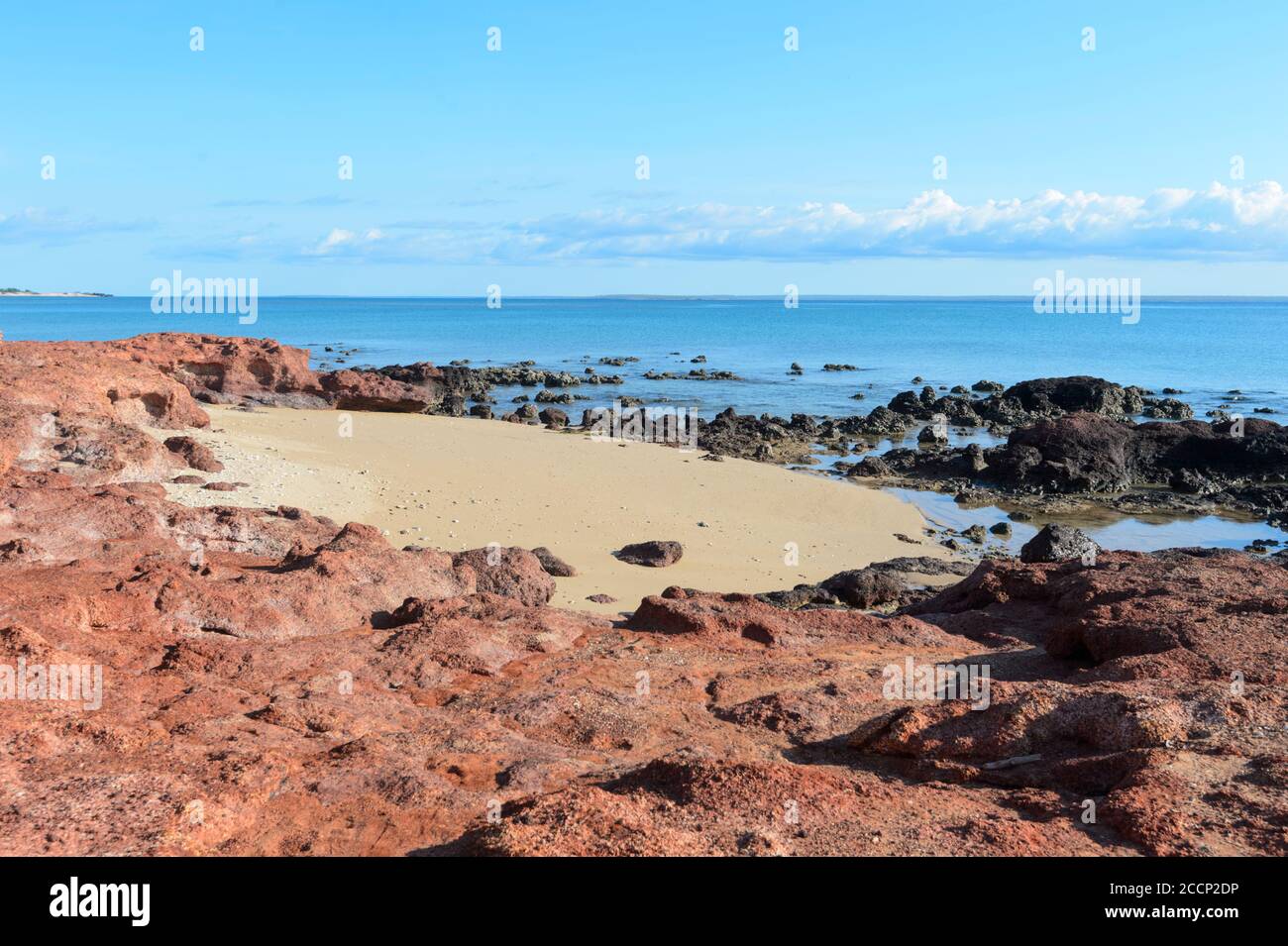 Scenic coastline with red rocks, Smith Point, Garig Gunak Barlu ...