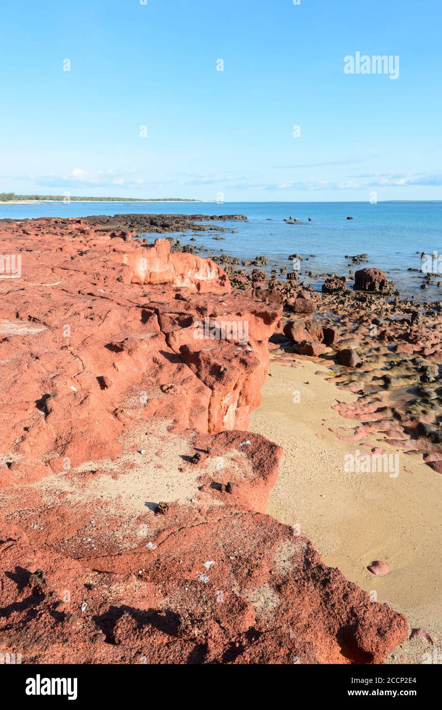 Vertical view of scenic coastline with red rocks, Smith Point, Garig ...
