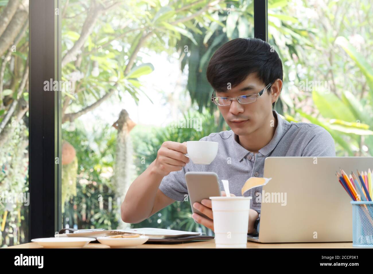 Work from home,Businessman working remotely from home. Using computer ...