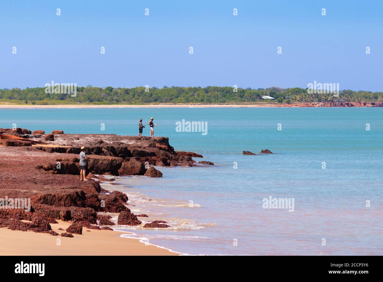 People fishing from the coast. Land based fishing, anglers catching ...