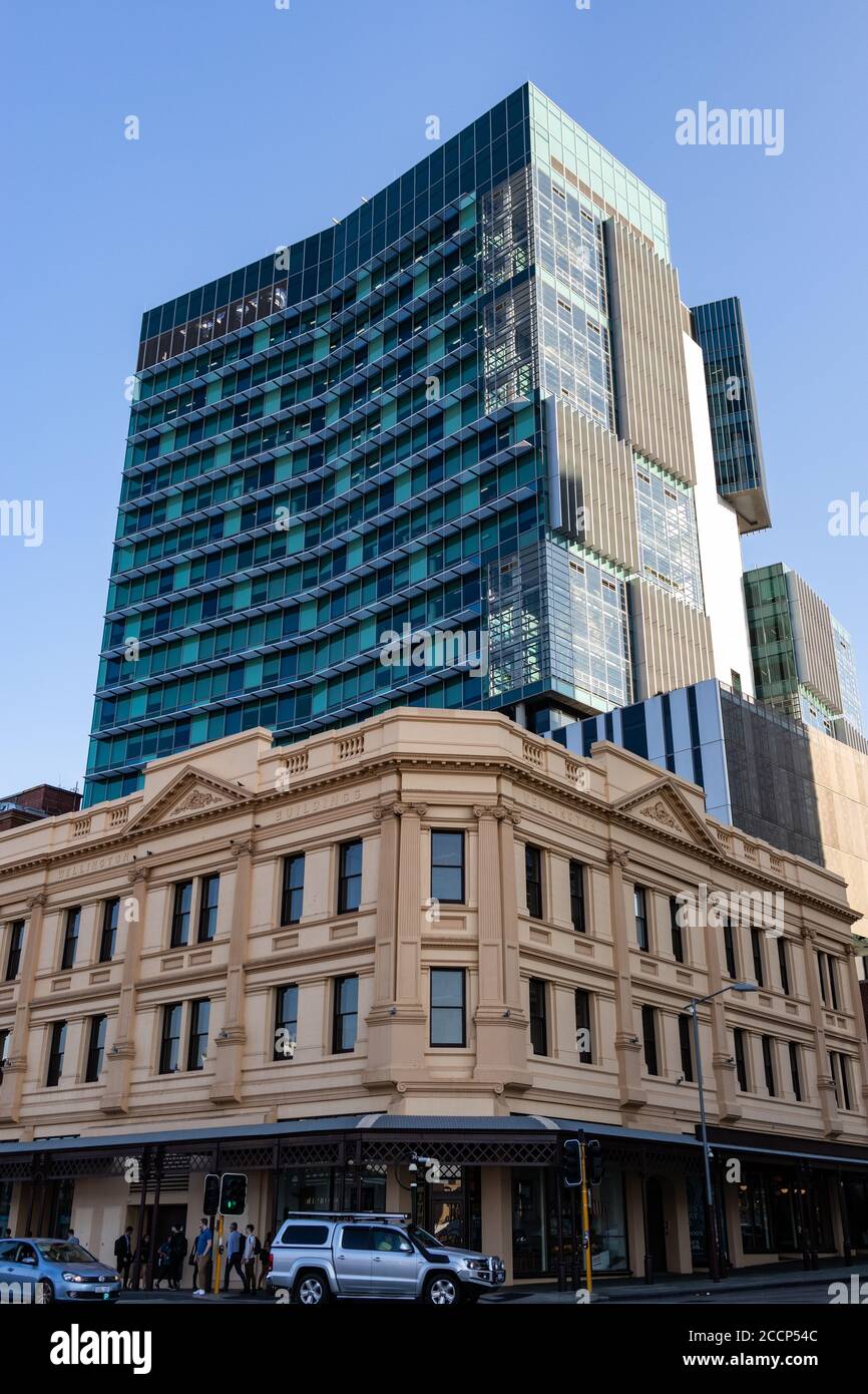 Traditional and modern buildings at the city. Skyscraper with blue ...