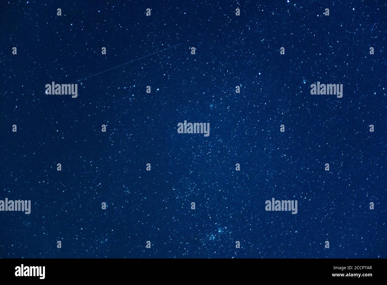 Starry sky at night with falling star. Astrophotography background ...