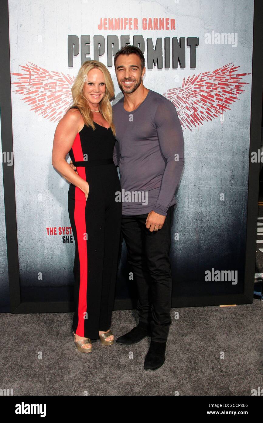 LOS ANGELES - AUG 28: Tracey Upton, Sam Upton at the Peppermint World Premiere at the Regal ...