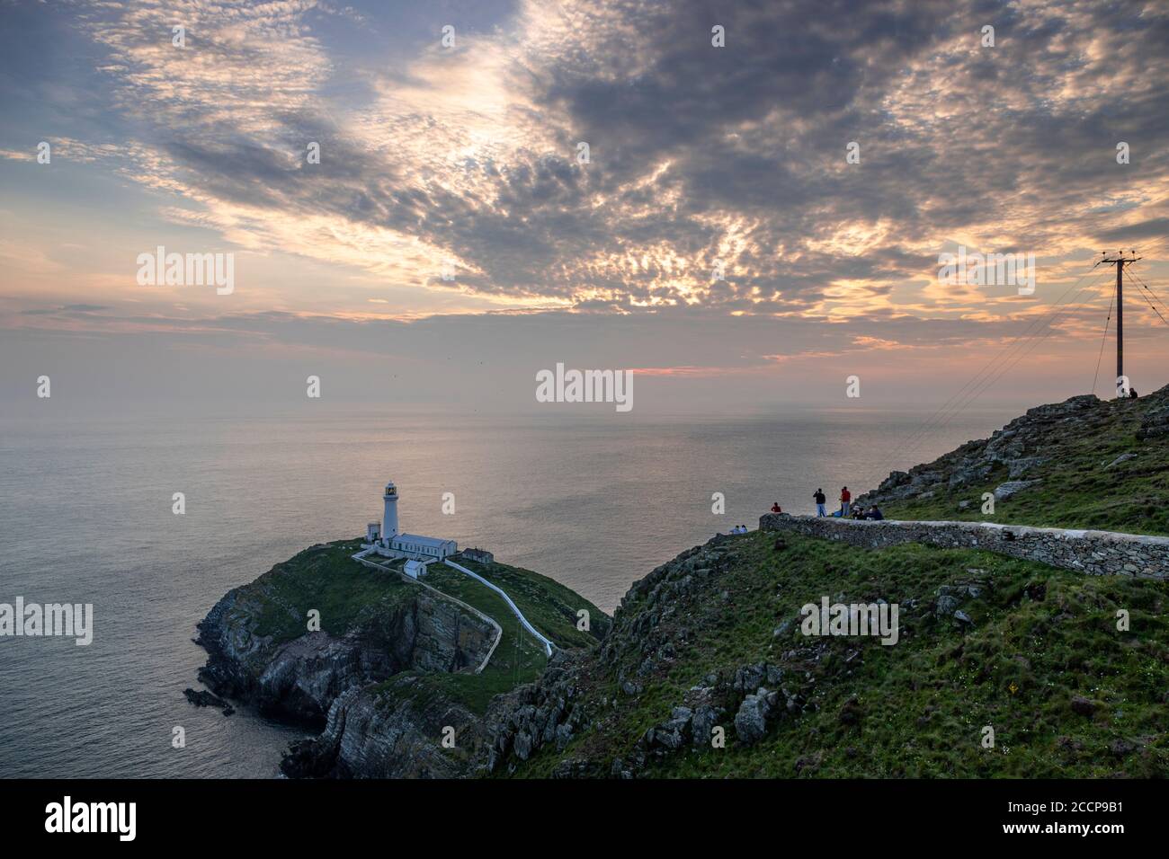 Sunset over South Stack lighthouse, Anglesey, North Wales Stock Photo ...