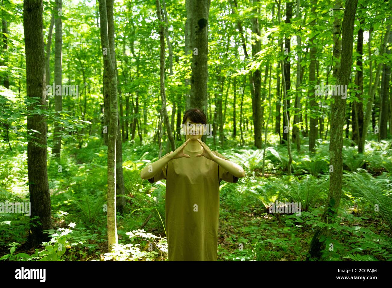 Mature Woman Expressing Earth in Sign Language Stock Photo - Alamy