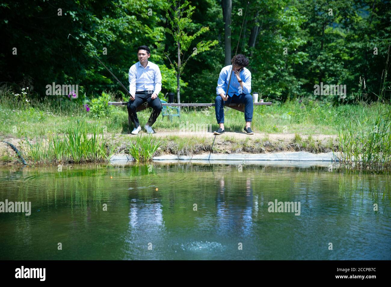 Young japanese man fishing hi-res stock photography and images - Alamy