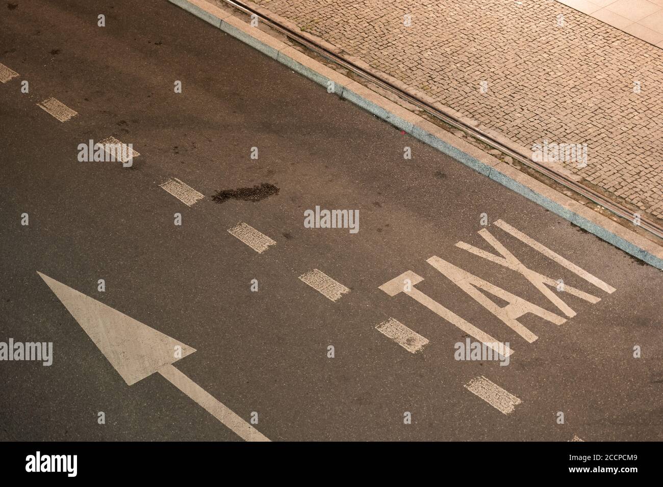 Street with empty taxi rank, stop or stand, cabstand and sidewalk at ...