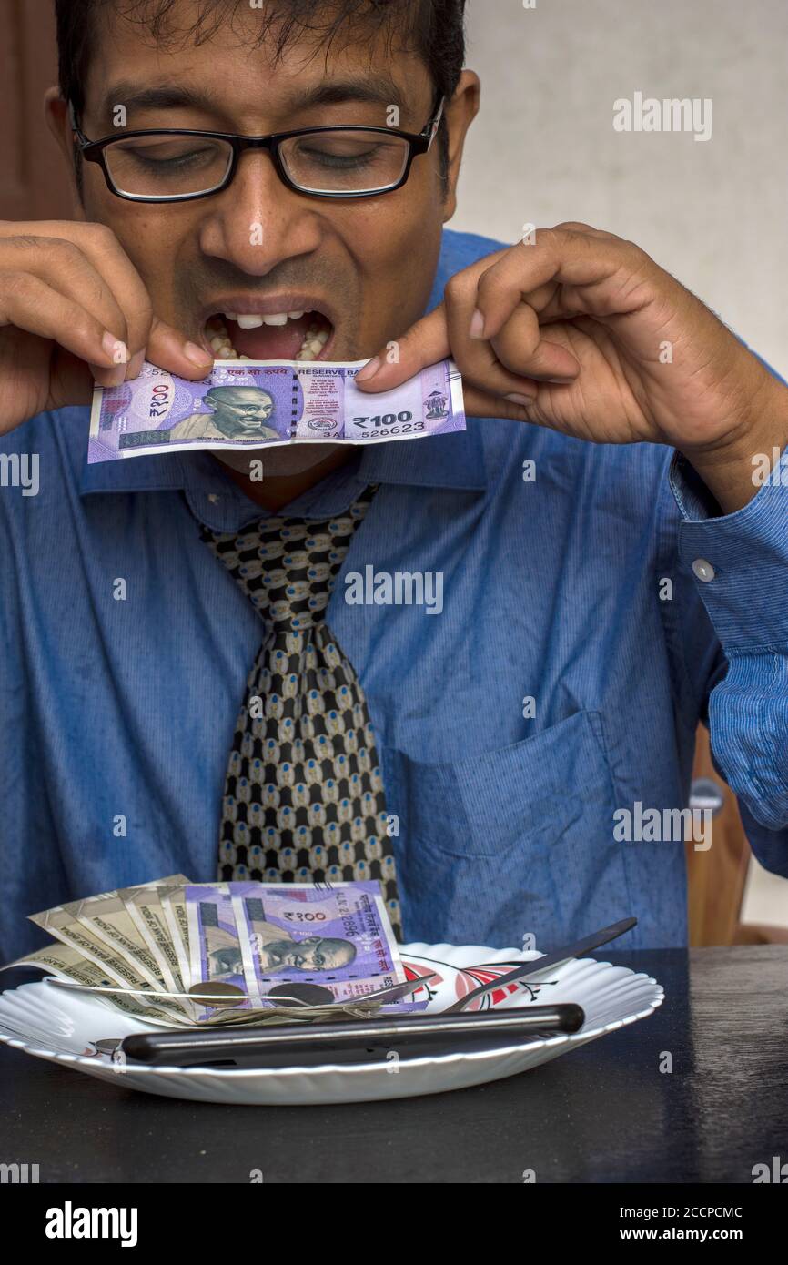 Greedy man eating hi-res stock photography and images - Alamy