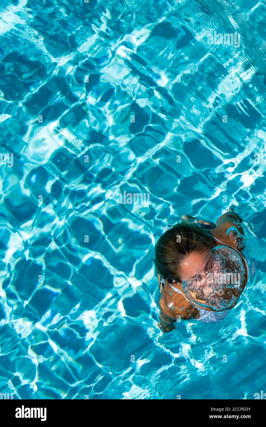 Woman diving pool hi-res stock photography and images - Alamy