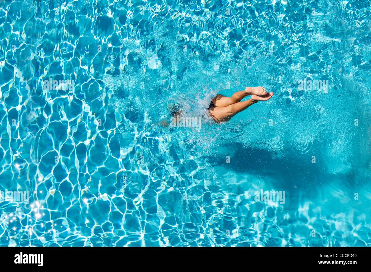 Woman Diving In Swimming Pool High Resolution Stock Photography and ...