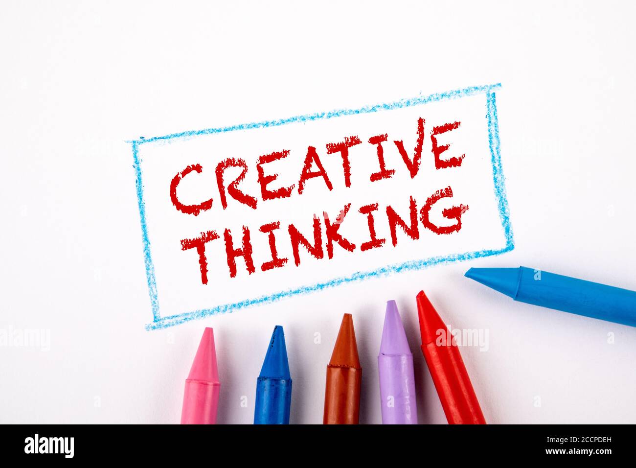 CREATIVE THINKING. Text on a white page. Colored pastels Stock Photo ...