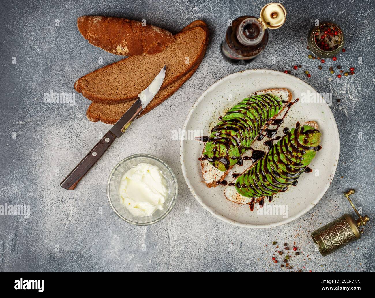 Rye bread toast with avocado, cream cheese (ricotta) and balsamic ...