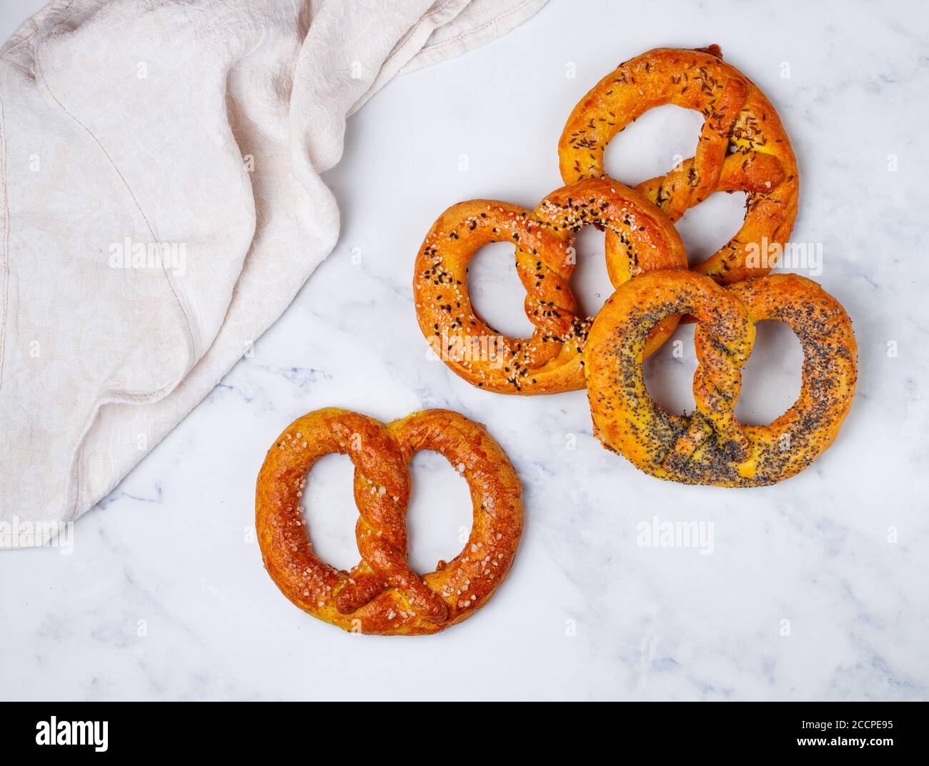 Pretzel. A set of different pretzels with black and white sesame, poppy ...