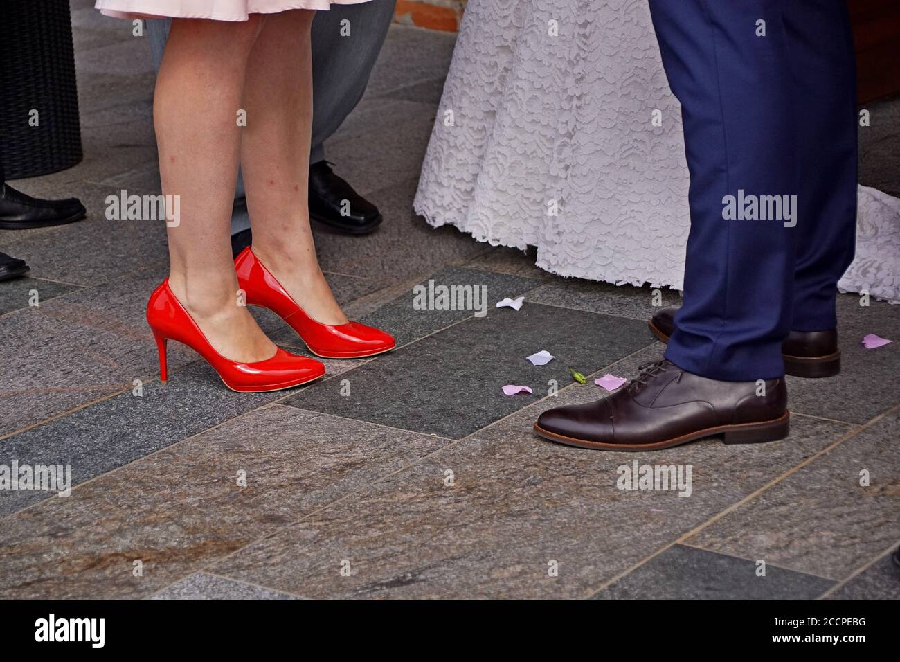 Woman walking barefoot street hi-res stock photography and images - Alamy