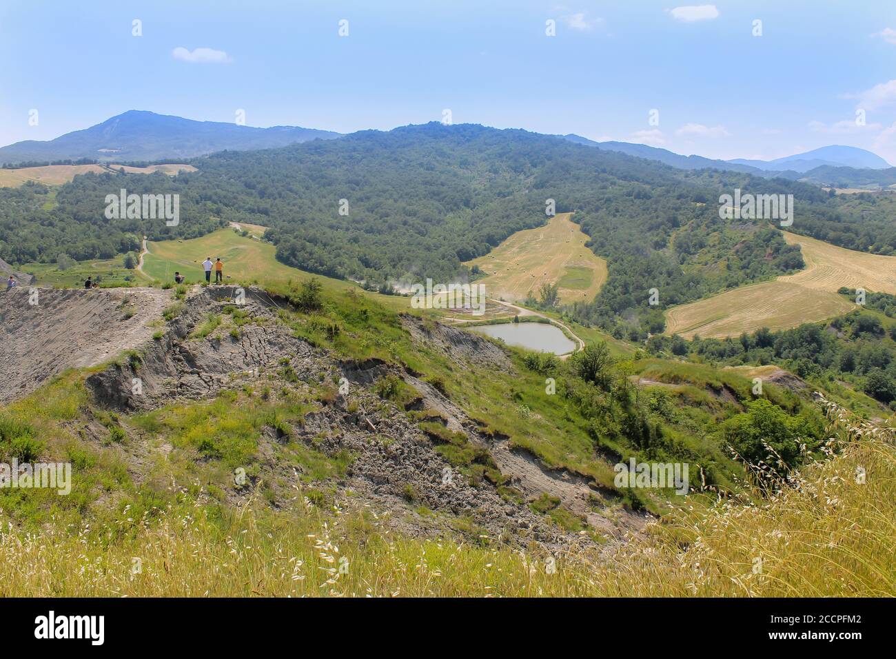 People standing on a mountain summit Stock Photo - Alamy