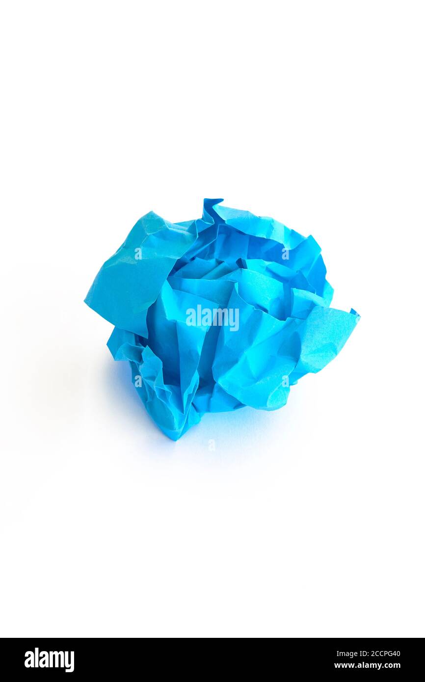 Crumpled blue paper isolated on white. Vertical Stock Photo - Alamy