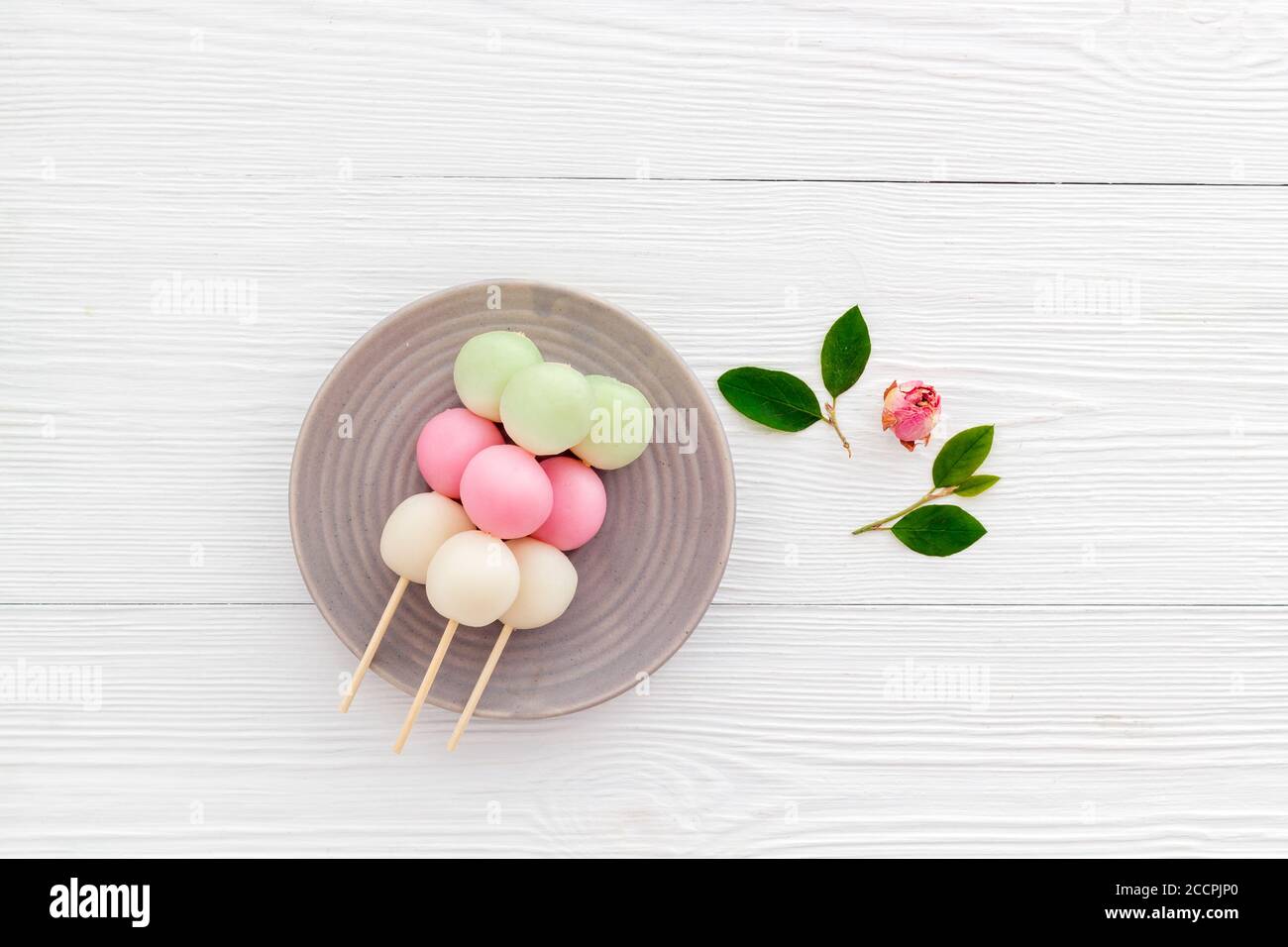 Japanese three colored dumplings Dango on plate, top view Stock Photo ...