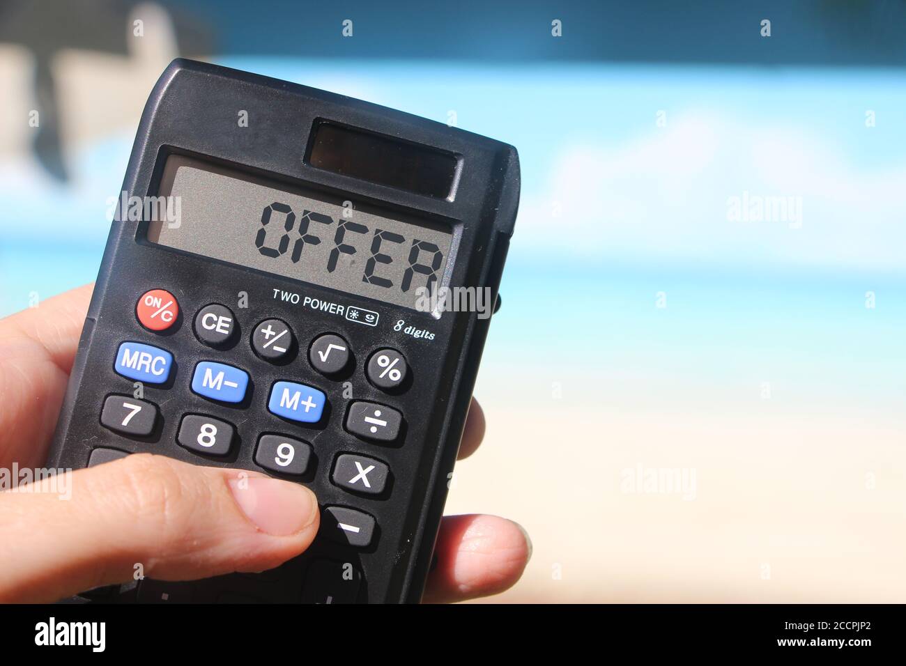 Calculator text OFFER on display. Tourism business concept Stock Photo ...