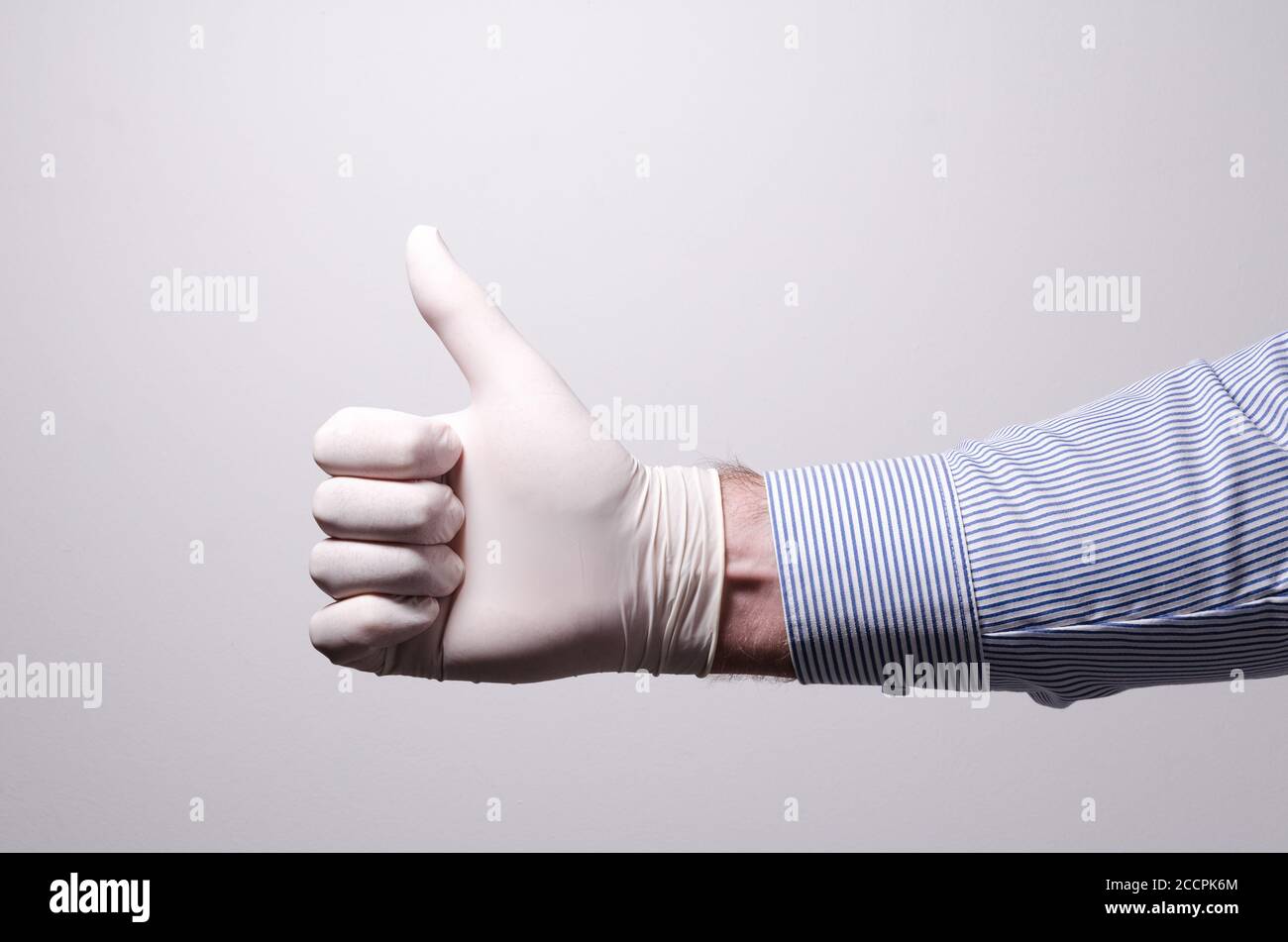 Thumbs point hi-res stock photography and images - Alamy