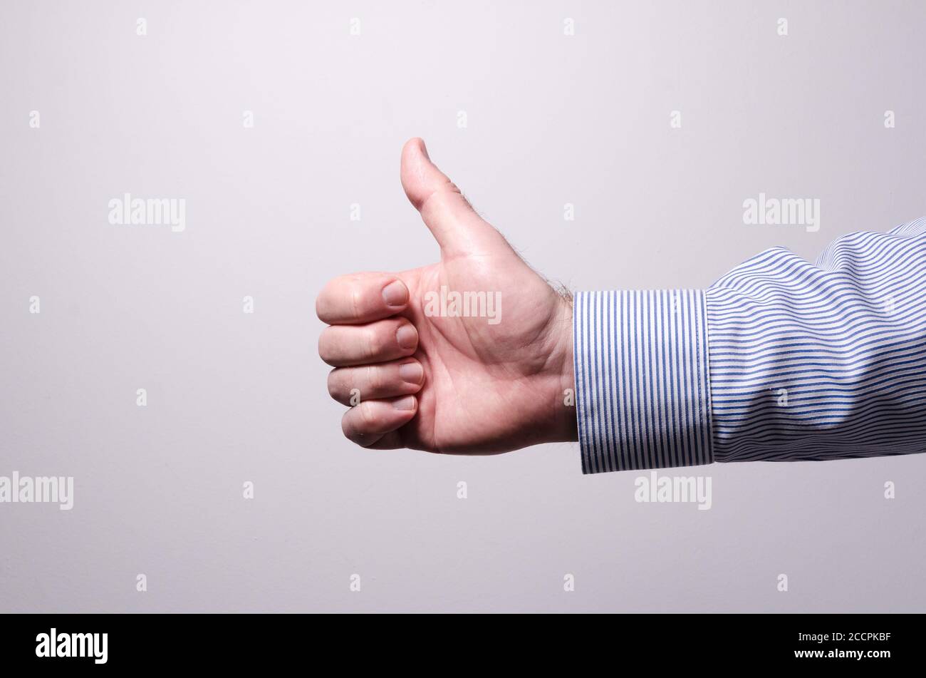 Pointing thumb hi-res stock photography and images - Alamy