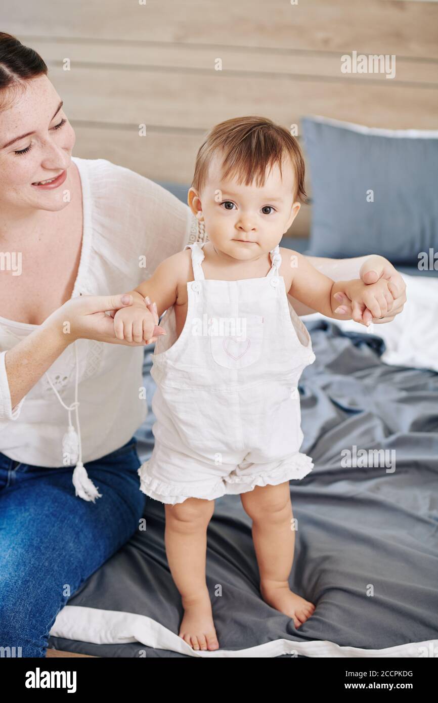 Learning how to walk Stock Photo - Alamy