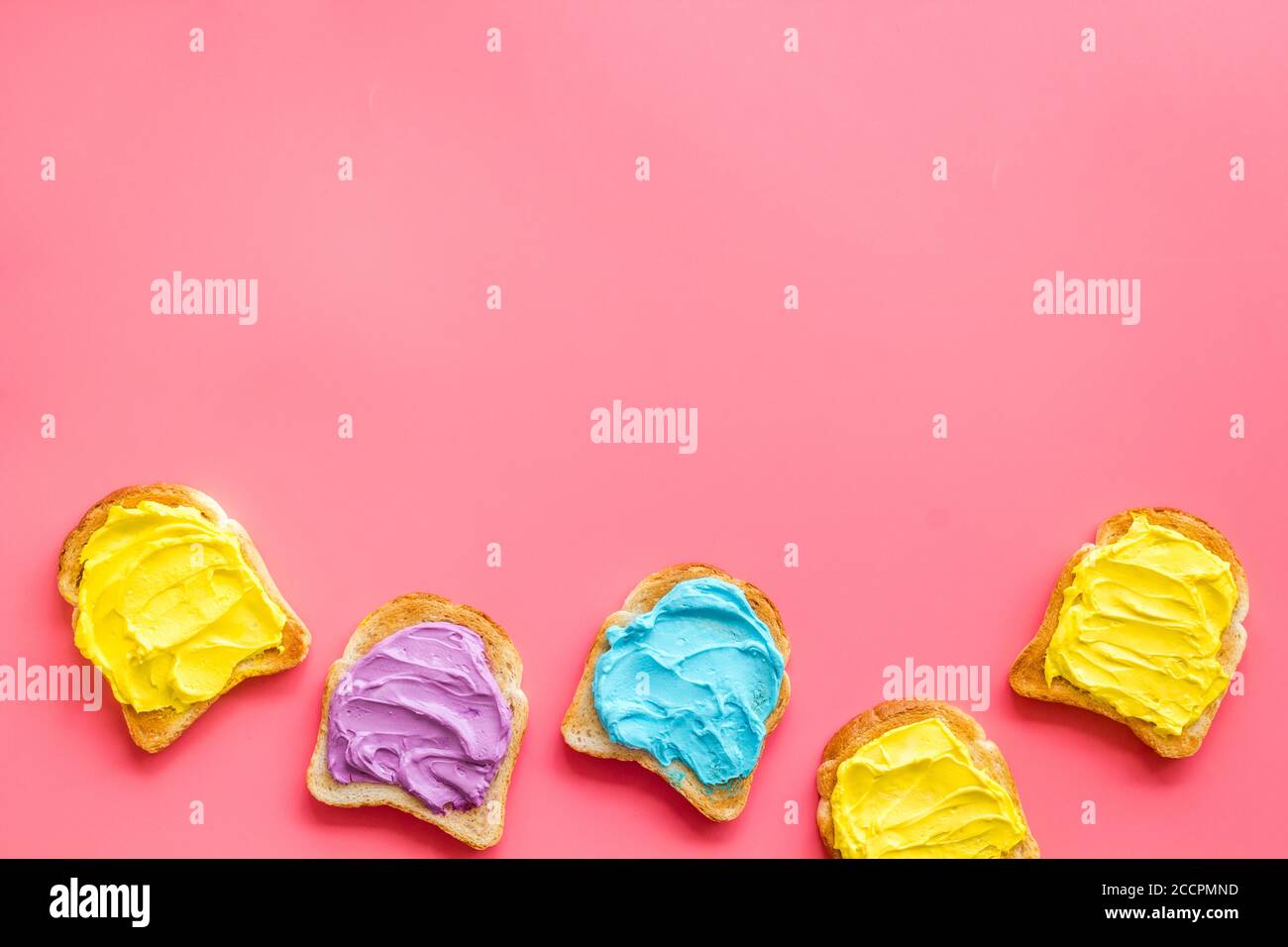 Unicorn colored toast bread slices. Food background, top view Stock ...