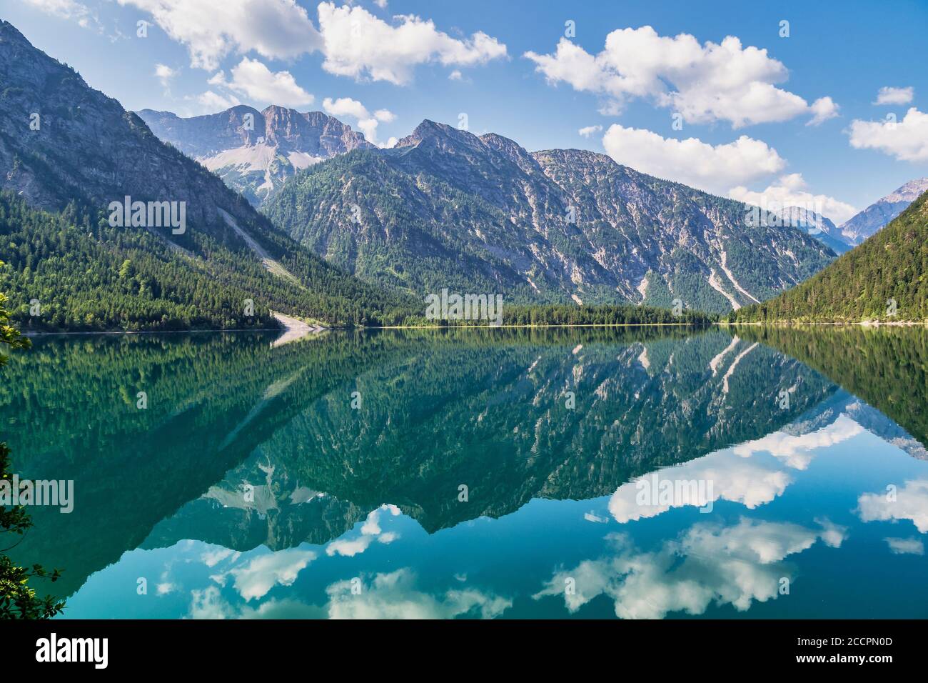 Lake Plansee in the Alps of Austria on a day in autumn Stock Photo - Alamy