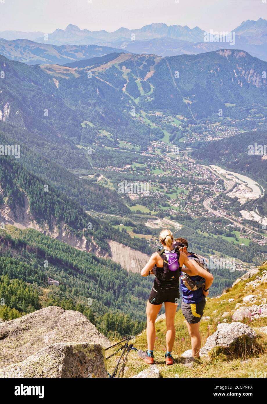 A couple hiking in the Alps Stock Photo - Alamy