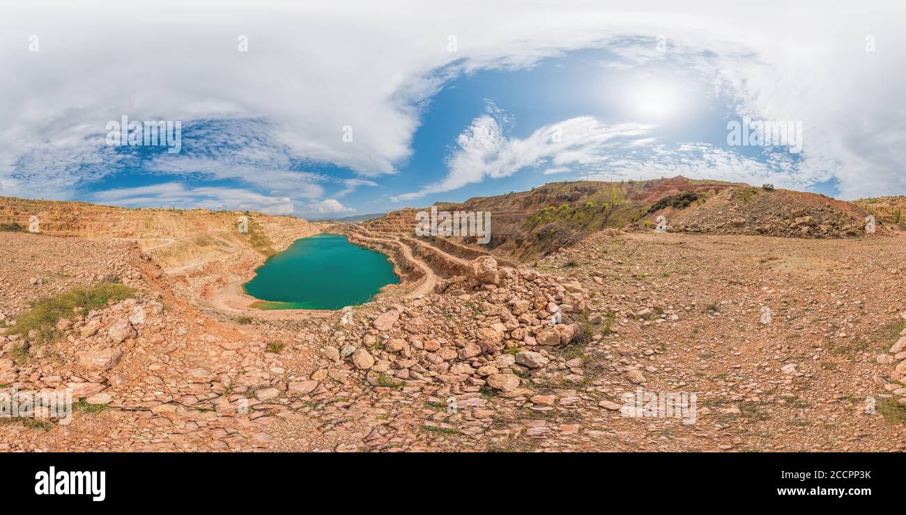 Spherical panorama of emerald lake in a flooded quarry. Emerald green ...