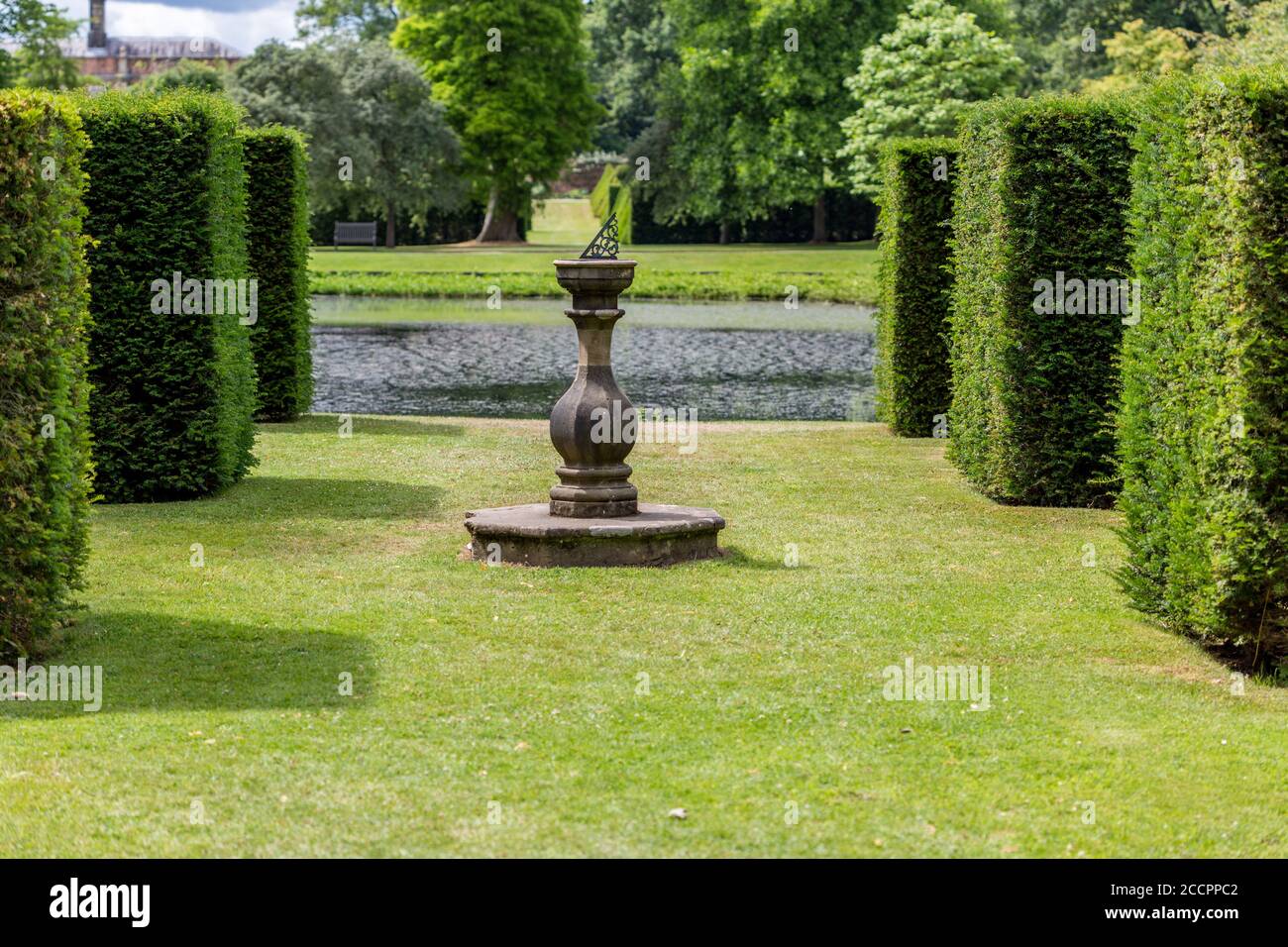 garden with yew hedges england uk Stock Photo - Alamy