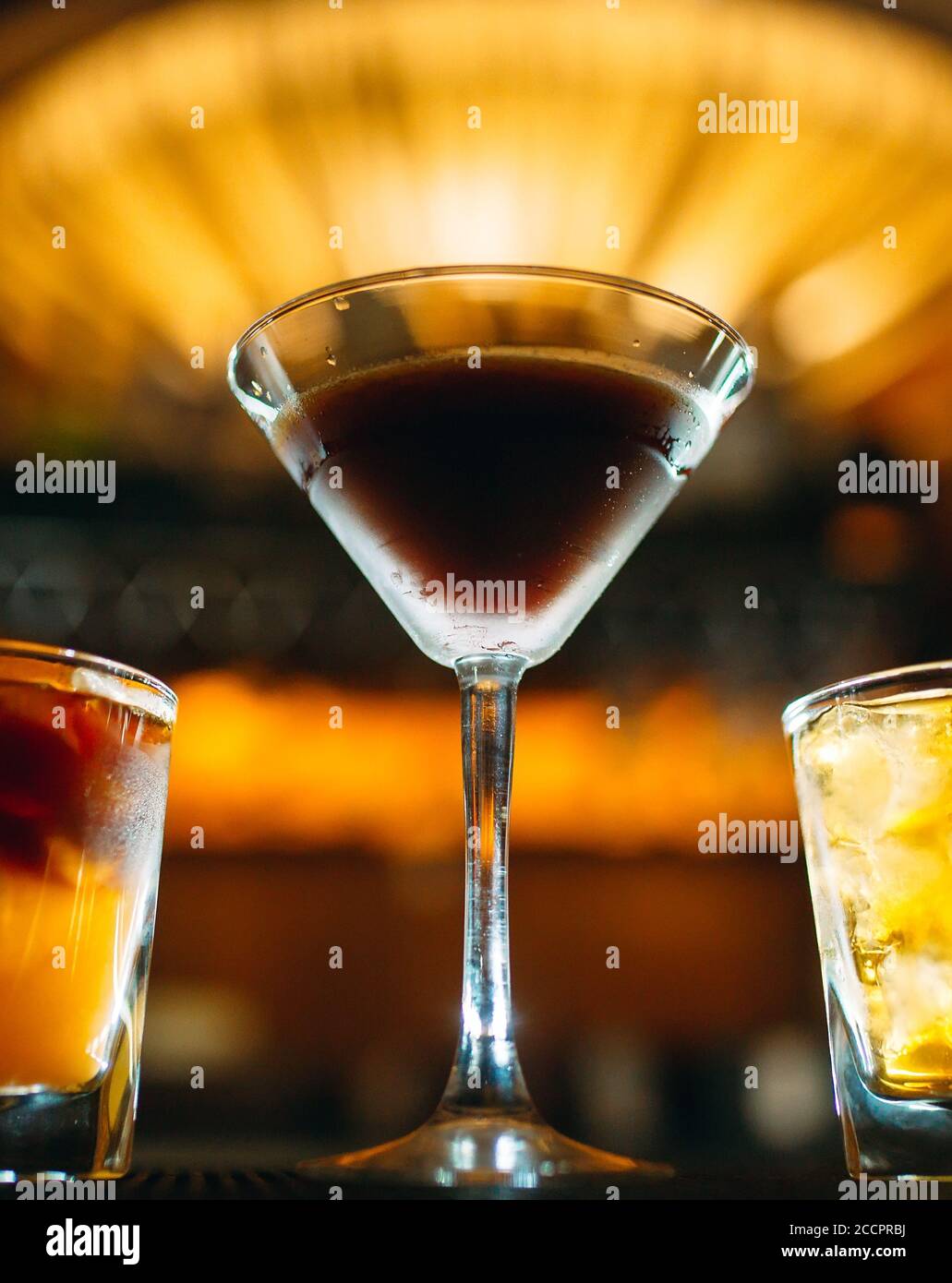 Alcoholic cocktails on the bar table in a restaurant Stock Photo - Alamy