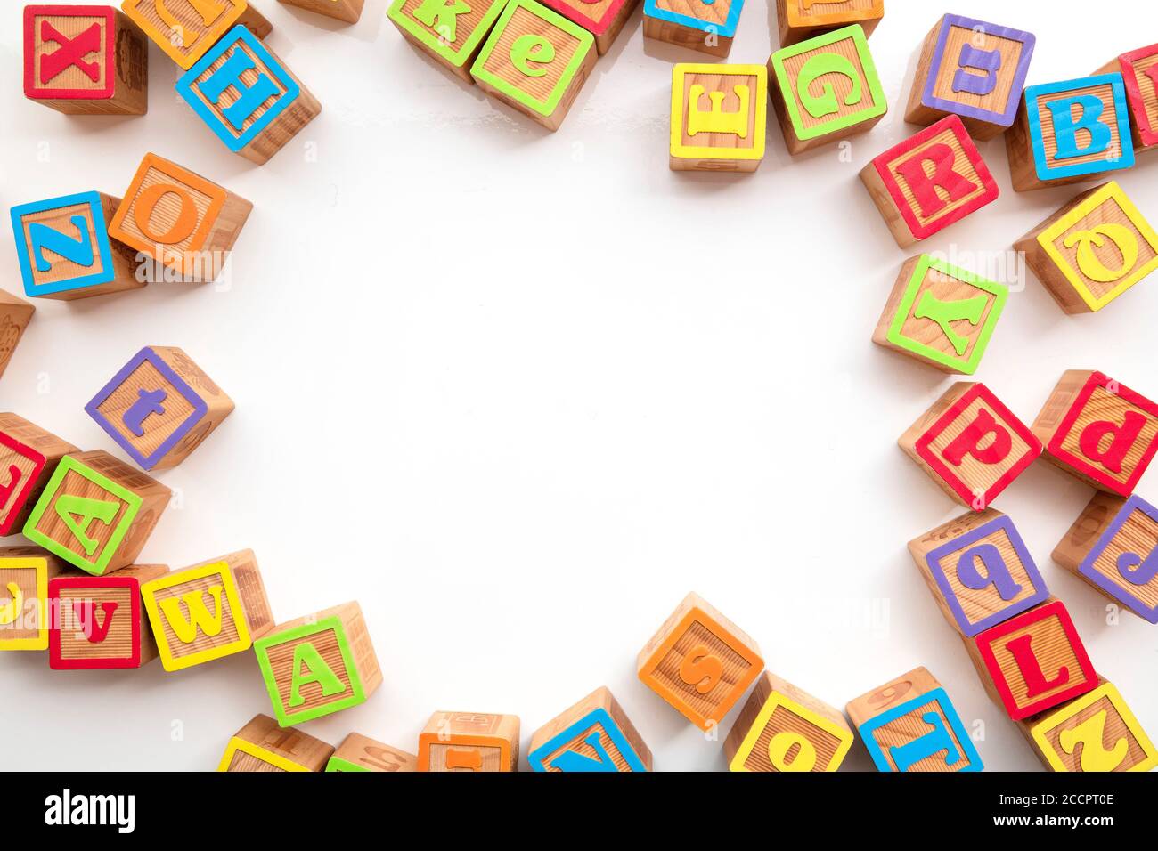 Colourful wooden ABC alphabet baby development blocks Stock Photo - Alamy