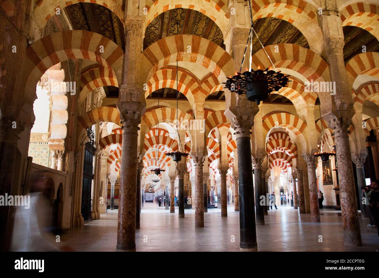 Alternating red and white voussoirs of the arches hi-res stock ...