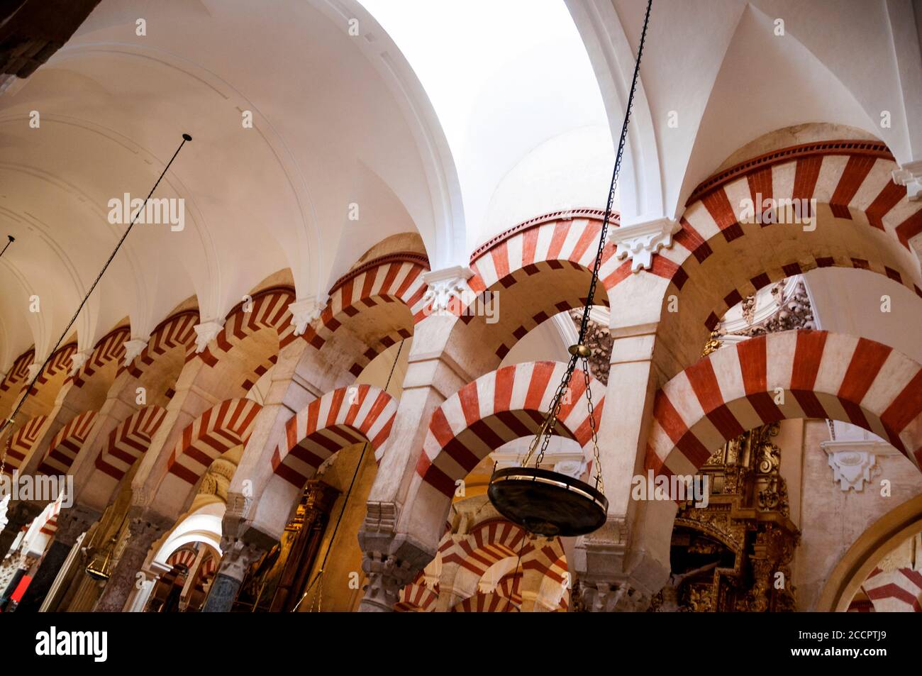 Alternating voussoirs of double arches at the Great Mosque of Cordoba ...