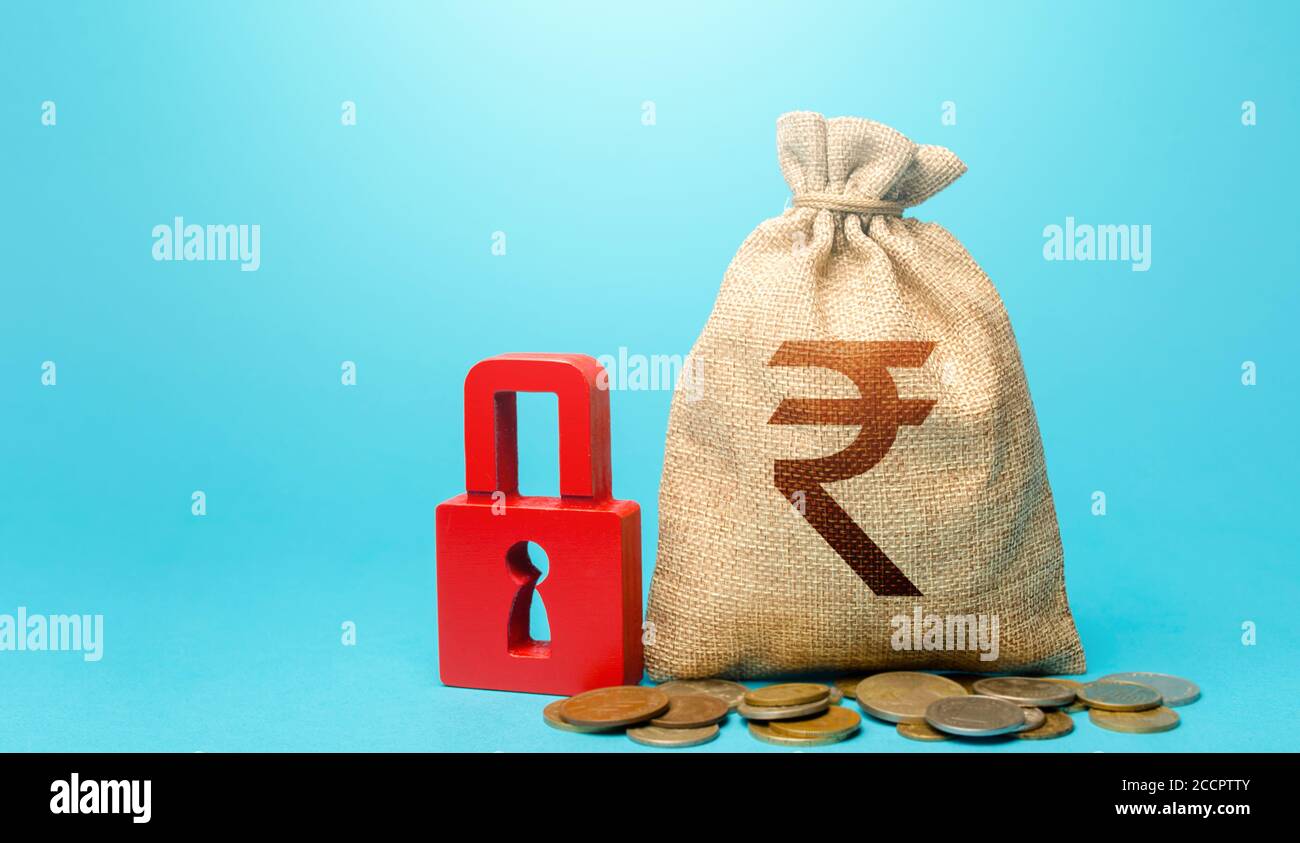 Indian Rupee Money Bag And Red Padlock Blocking Bank Accounts And