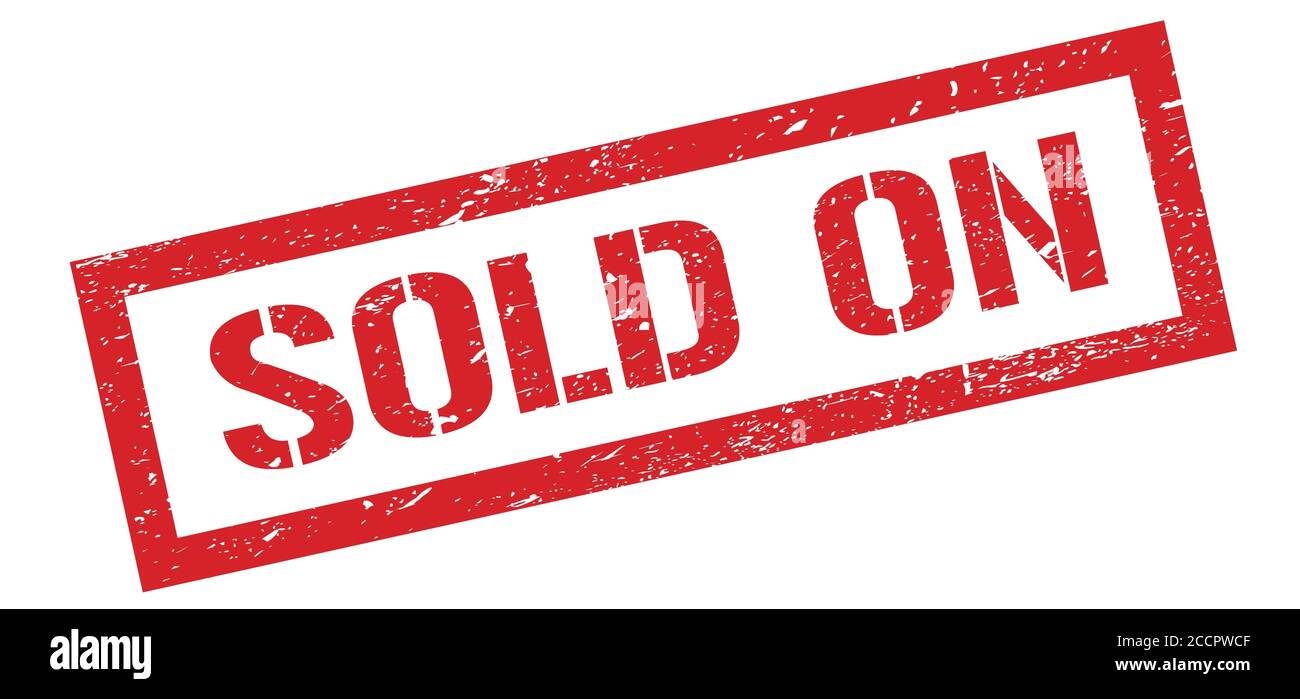 SOLD ON red grungy rectangle stamp sign Stock Photo - Alamy
