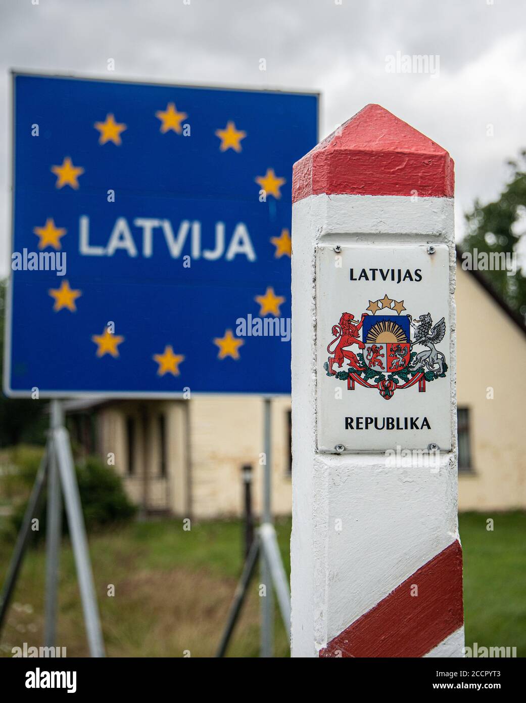 Border sign of Latvia located on the border between Latvia and ...