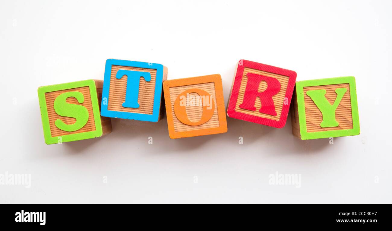 Story word made from colourful wooden baby development blocks Stock ...