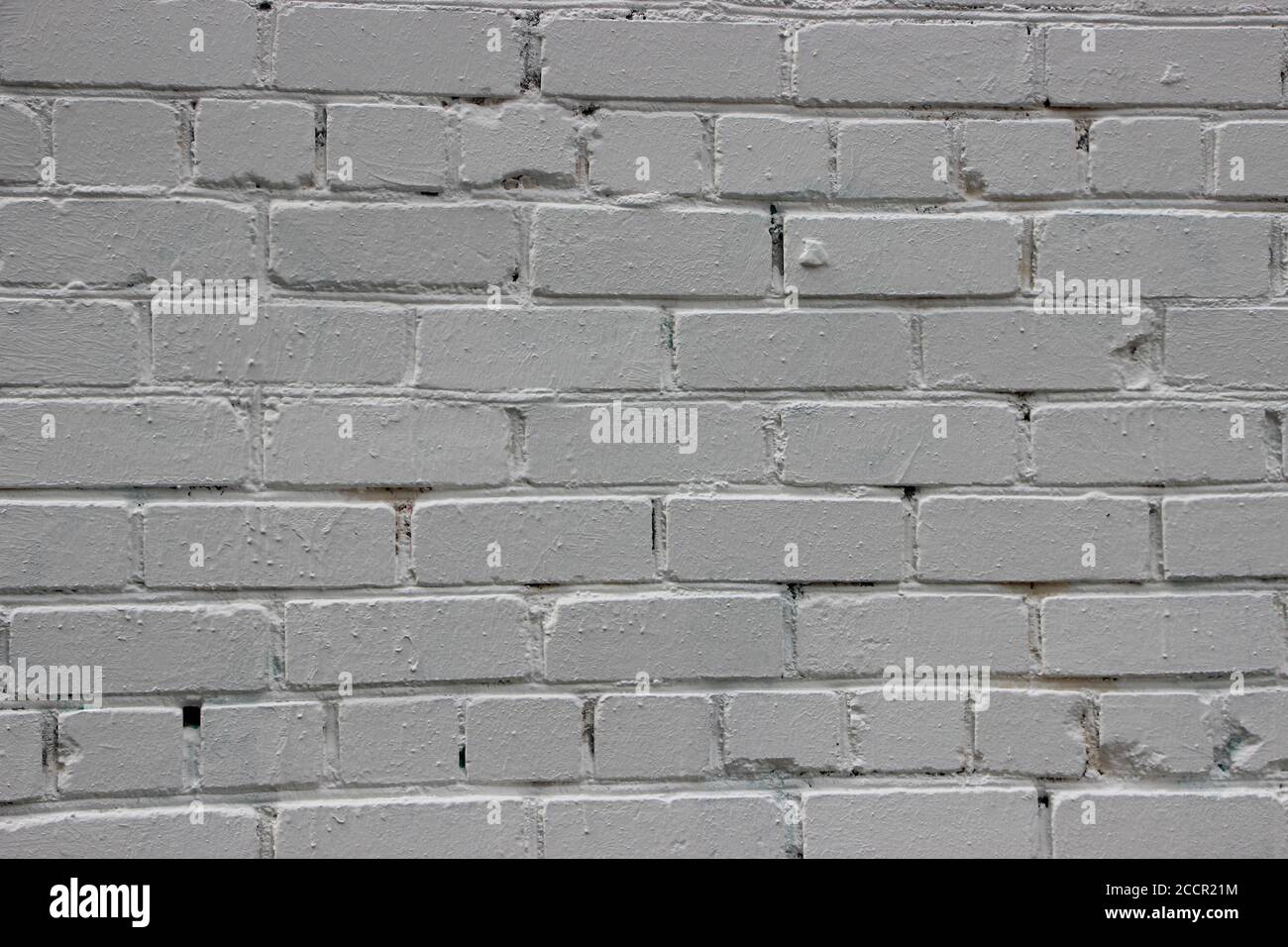 Light grey grunge brick wall background texture Stock Photo - Alamy