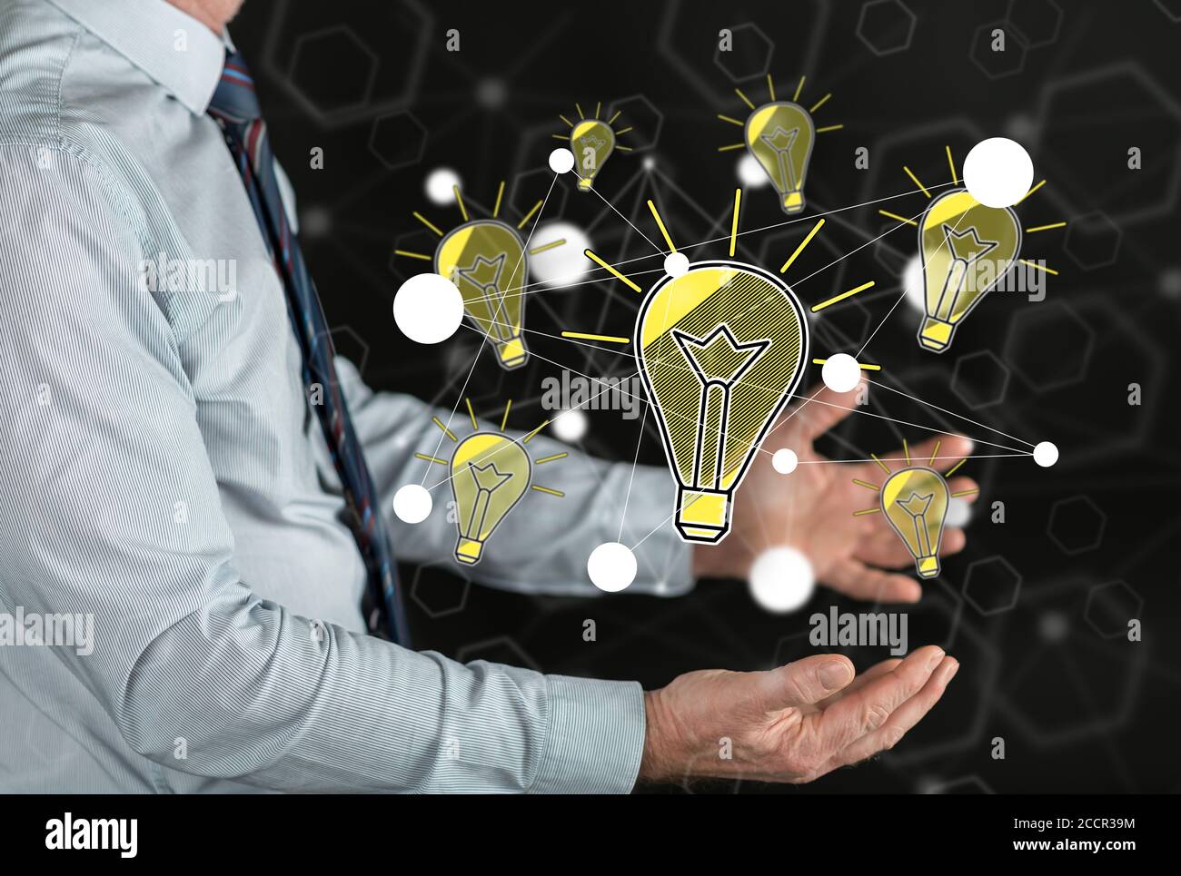 Innovation concept above the hands of a man Stock Photo - Alamy
