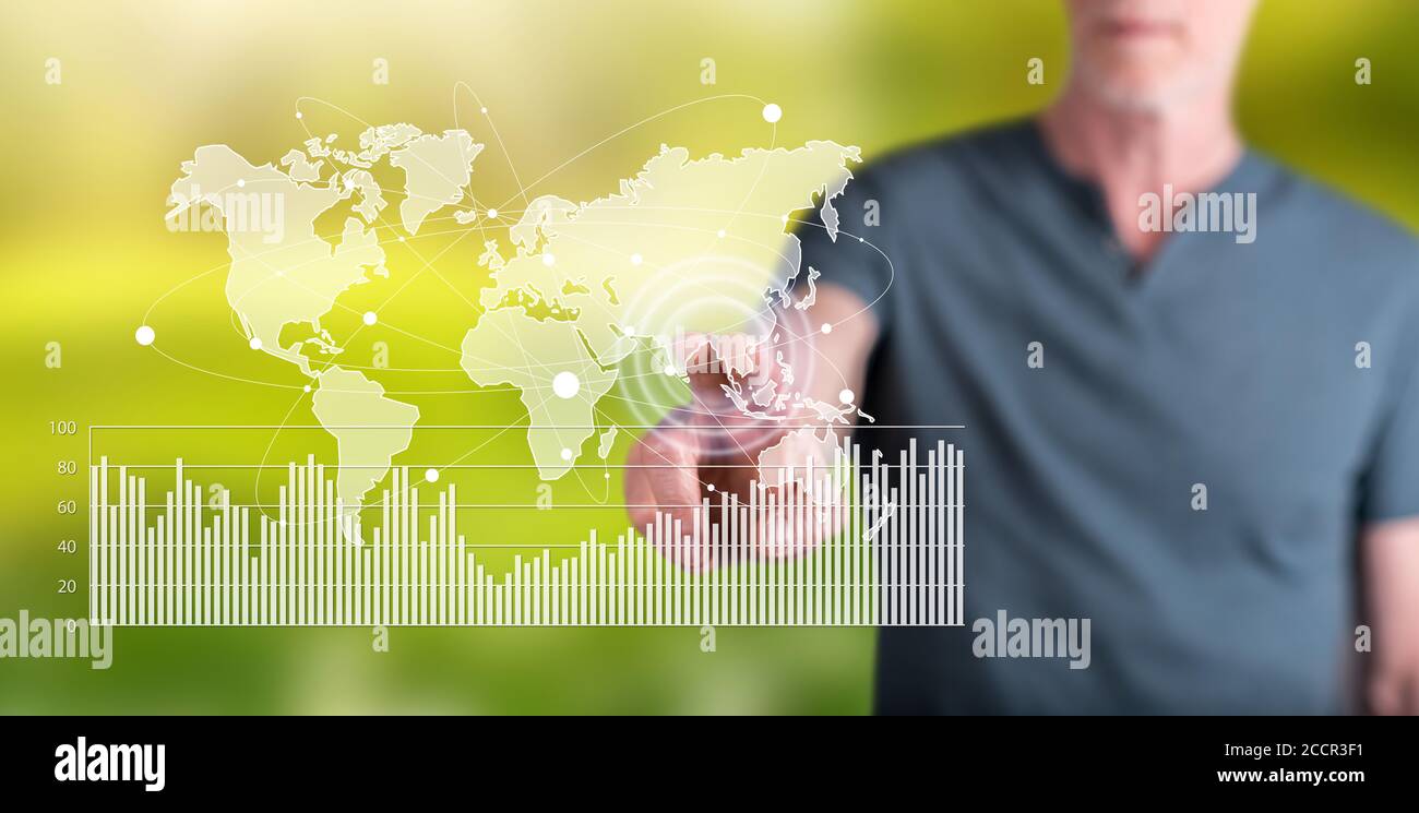 Man touching a digital marketing statistics concept on a touch screen ...