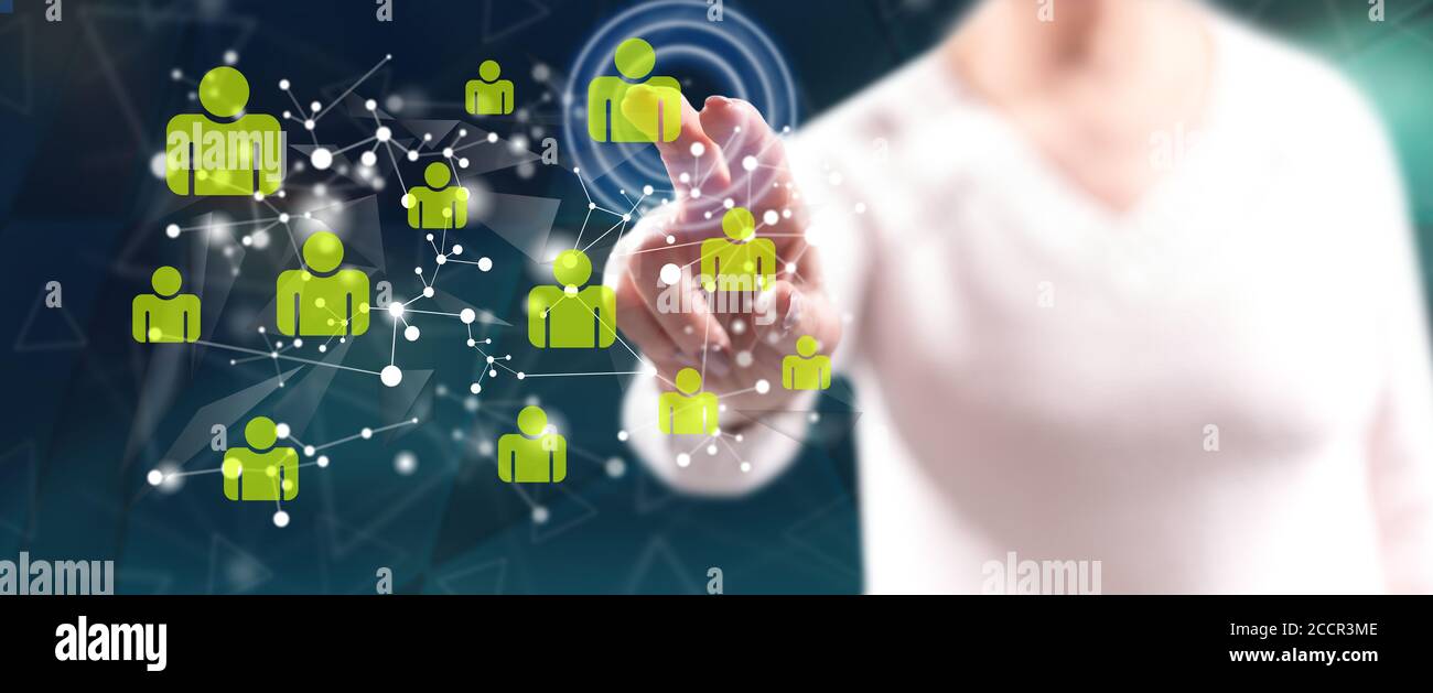 Woman touching a social network on a touch screen with her fingers ...