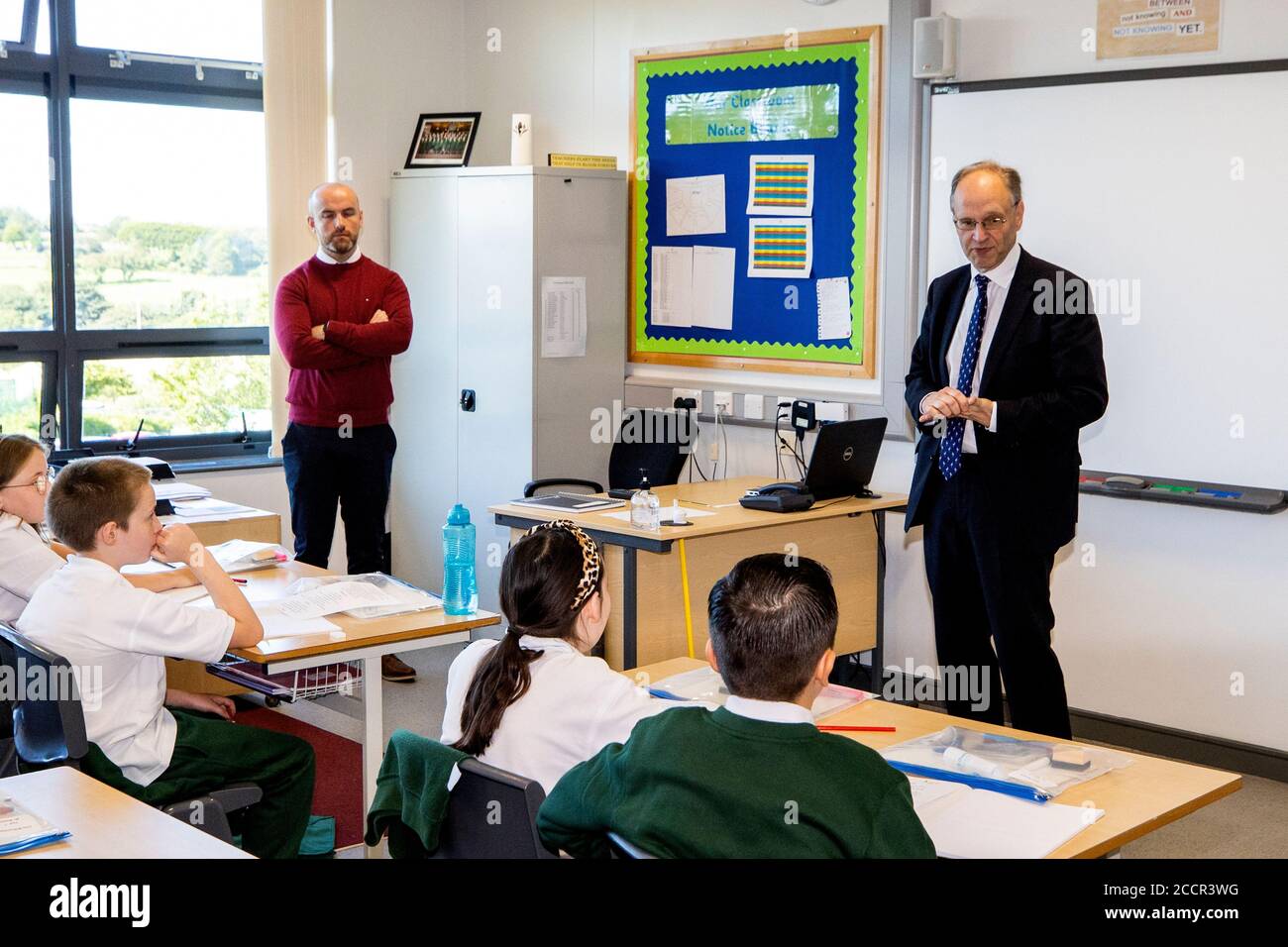 Education Minister Peter Weir talking with pupils at St Joesph's ...